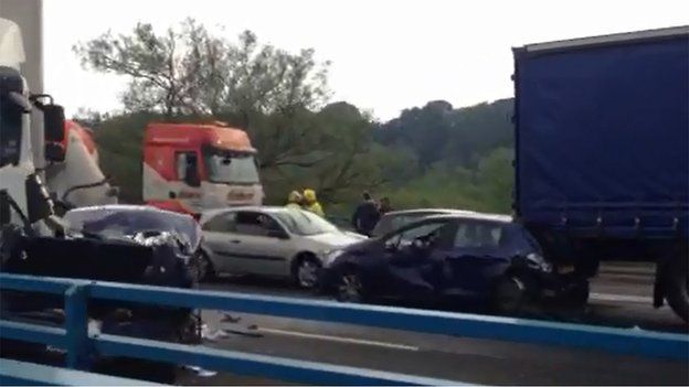 Several hurt in major crash involving cars and lorries on M74 - BBC News