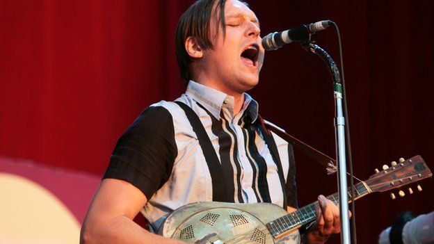 Win Butler defends Arcade Fire We Exist music video - BBC News