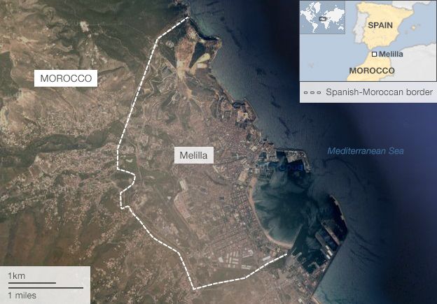 Spain's Melilla enclave stormed by migrants - BBC News
