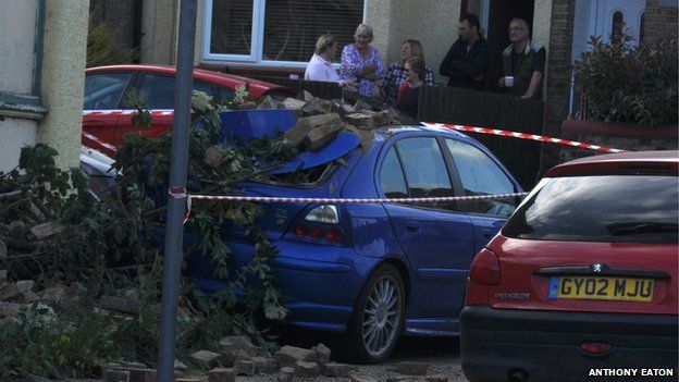 Grays roof collapse falls on once-in-a-decade parked car - BBC News