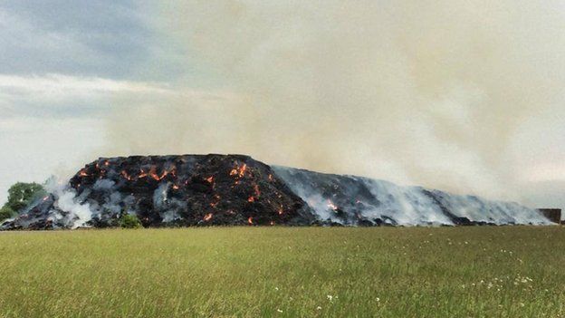 Waterbeach lightning strike haystack to 'burn for several days' - BBC News