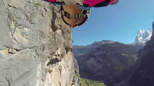 The girls base jumping off cliffs in the Swiss Alps - BBC News