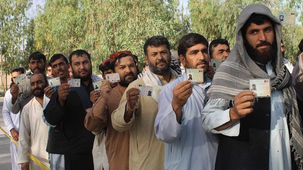 Afghan election: Run-off vote held amid violence - BBC News