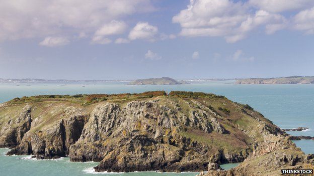 Lord Faulk tours Channel Islands - BBC News