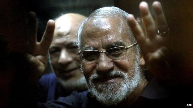 Egypt Brotherhood chief Badie sees death sentence cut - BBC News