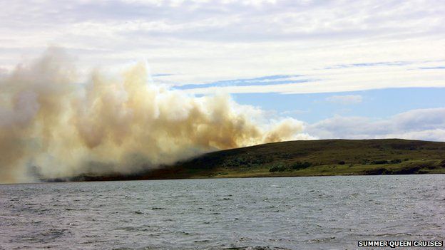 Firefighters tackle wildfire in Scoraig peninsula - BBC News