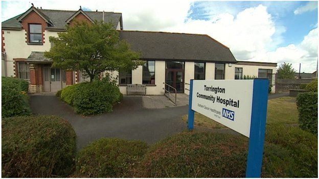 Hundreds attend Axminster Hospital cuts meeting - BBC News