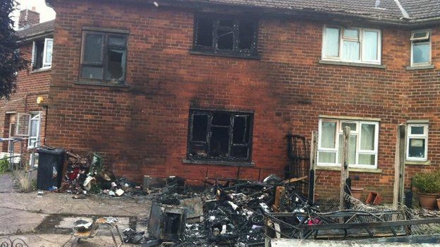 Photos of woman's late son lost in Lincoln arson attack - BBC News