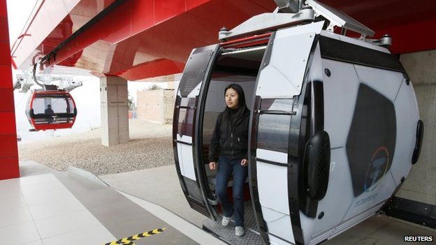 World's highest urban cable car proves 'a success' - BBC News