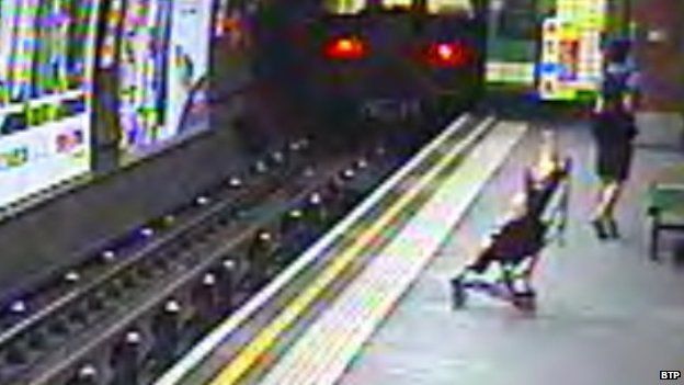 Child in buggy blown on to London Tube station tracks - BBC News