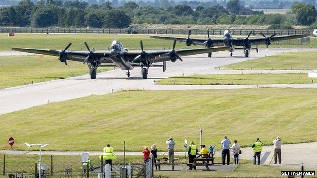 Lancasters and Vulcan unite for Lincoln flypast - BBC News