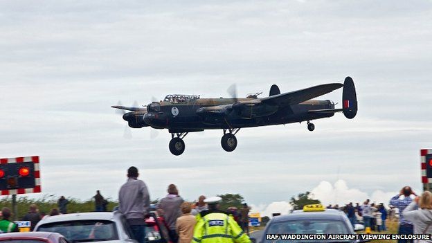Lancasters and Vulcan unite for Lincoln flypast - BBC News