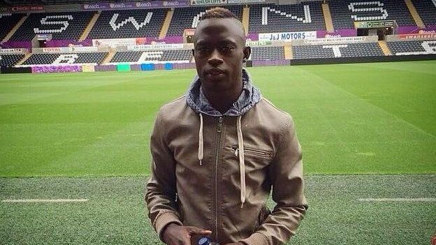 Gambian forward Modou Barrow signs long-term Swansea deal - BBC Sport