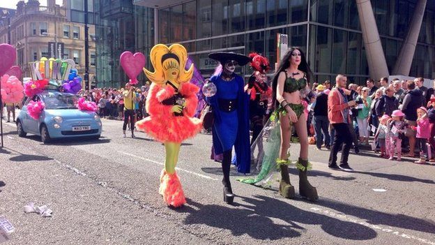 Thousands turn out for Manchester Pride parade - BBC News