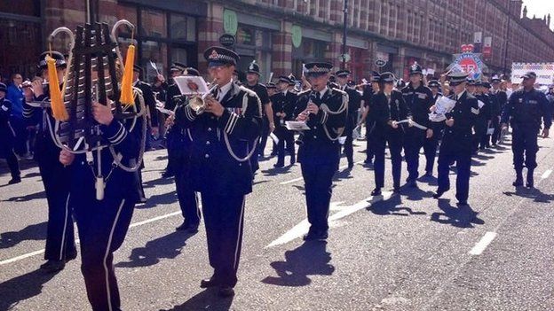 Thousands turn out for Manchester Pride parade - BBC News
