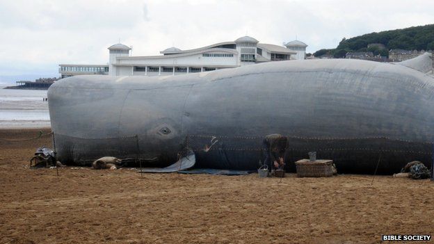 Banned Biblical whale inflated on beach in Weston-super-Mare - BBC News