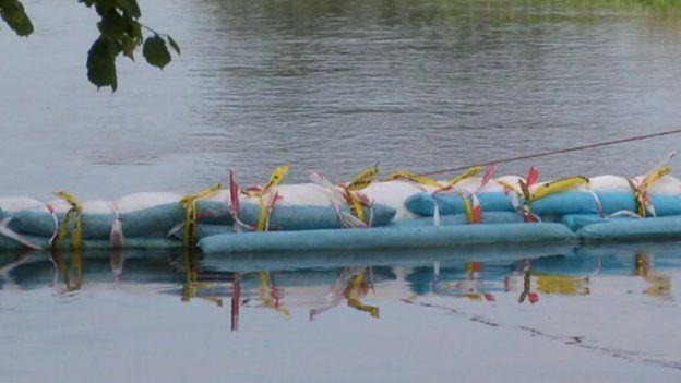 Fire-leaked fuel removed from River Culm - BBC News