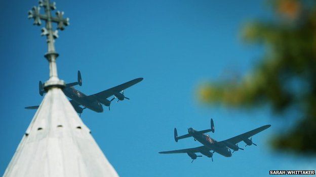 Two Lancasters fly together for the last time - BBC News