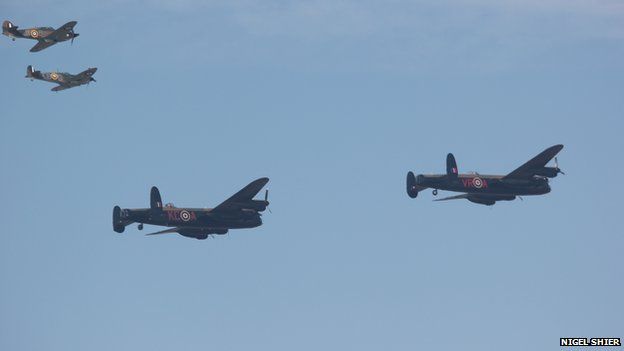 Two Lancasters fly together for the last time - BBC News