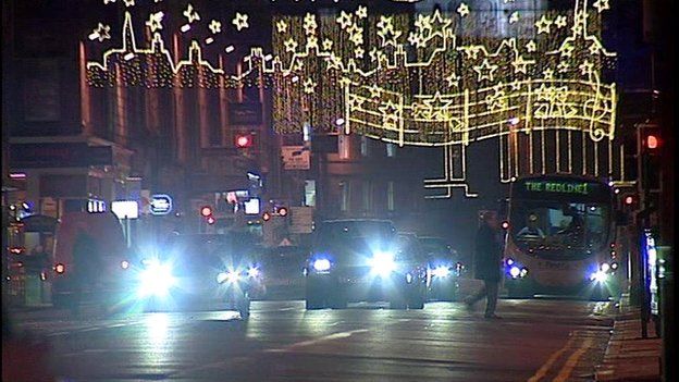 Thousands watch Aberdeen Christmas lights parade - BBC News