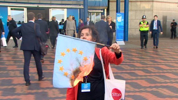 European Union flag 'burnt' at Tory conference - BBC News