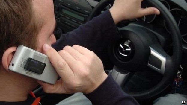 Police crackdown on drivers using mobiles at the wheel - BBC News