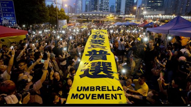 Thousands mark one month of Hong Kong protests - BBC News