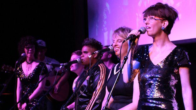 We’re adults, not children, says learning disabled girl band - BBC News