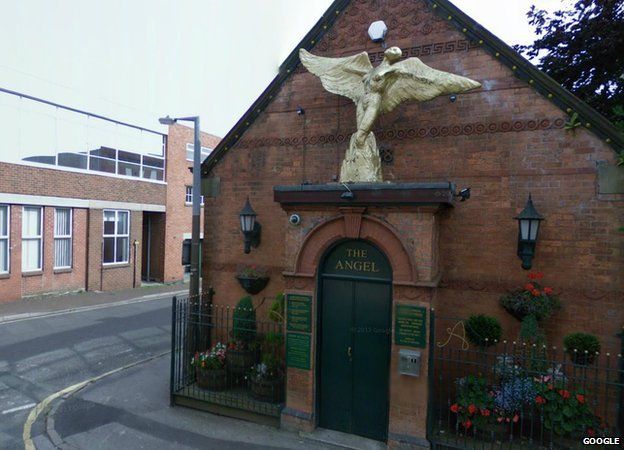 The Angel in Ripley is 'England's most Christmassy pub' - BBC News