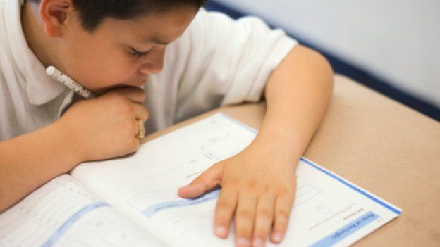 Poor pupils narrow achievement gap, league tables show - BBC News