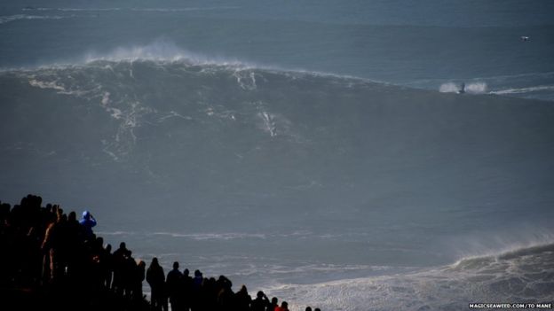Surfers ride 'weather bomb' waves in Spain and Portugal - BBC News