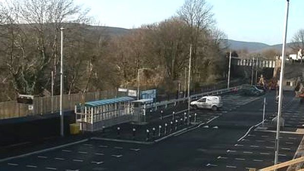 First train pulls into Pye Corner £3.5m railway station - BBC News