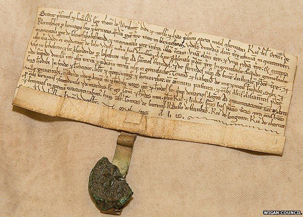 800-year-old contract to go on show in Wigan - BBC News