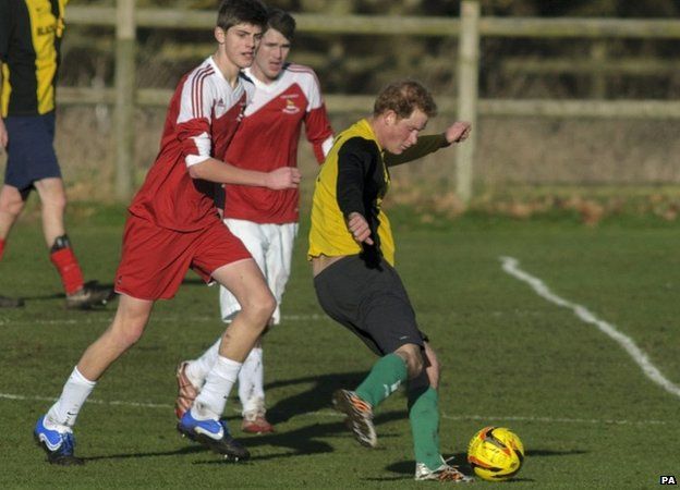 Prince Harry in Christmas Eve football match - BBC News