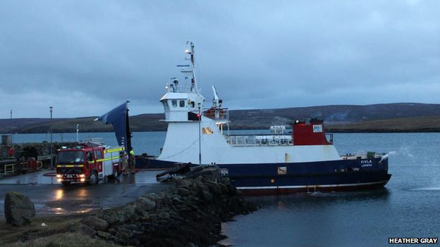 Shetland ferry crashes into rocks at Unst harbour - BBC News
