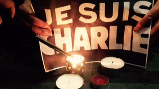 Cardiff Bay vigil after French terror attacks - BBC News