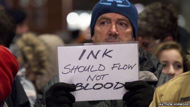 Cardiff Bay vigil after French terror attacks - BBC News