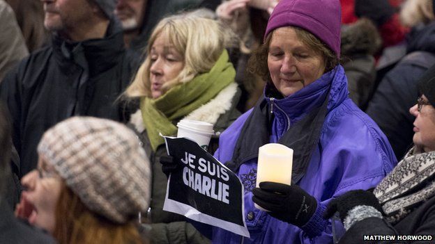 Cardiff Bay vigil after French terror attacks - BBC News