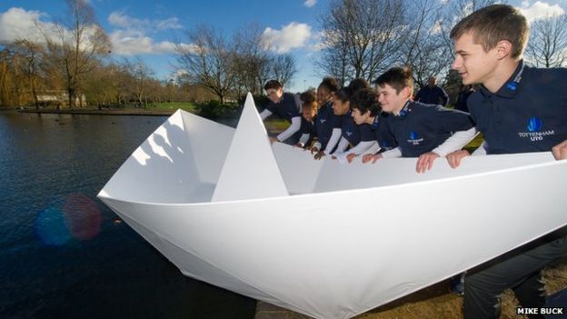 Giant origami boat launched on Southwark boating lake - BBC News