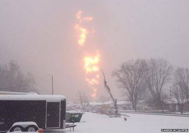 Fiery train crash forces W Virginia towns to evacuate - BBC News