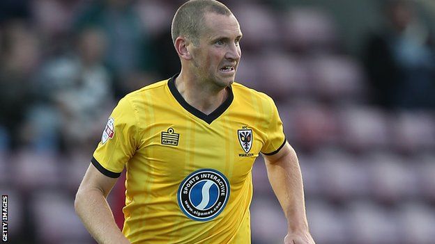 Andy Frampton: AFC Wimbledon defender announces retirement - BBC Sport