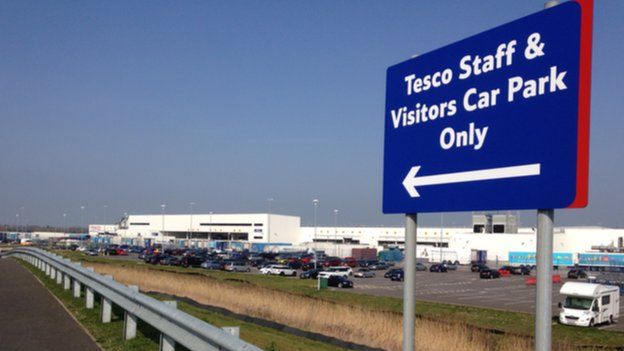 Woman and children found in lorry at Tesco depot - BBC News