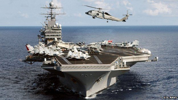 Navy warship USS Theodore Roosevelt arrives in Solent - BBC News