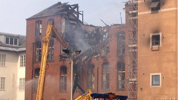 Nottingham factory fire: Expected to continue 'into next week' - BBC News
