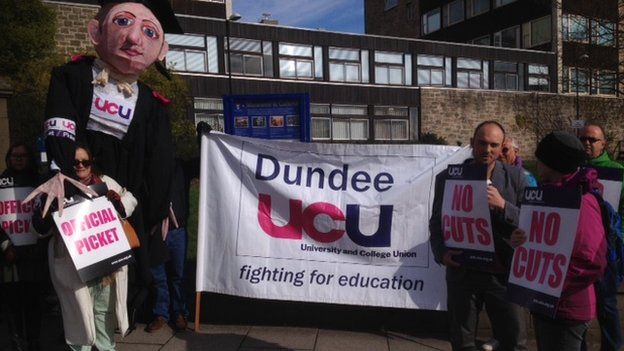 Dundee University staff on strike in row over job cuts - BBC News