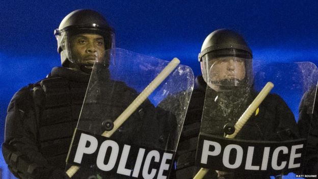 Baltimore: A night of rioting in pictures - BBC News