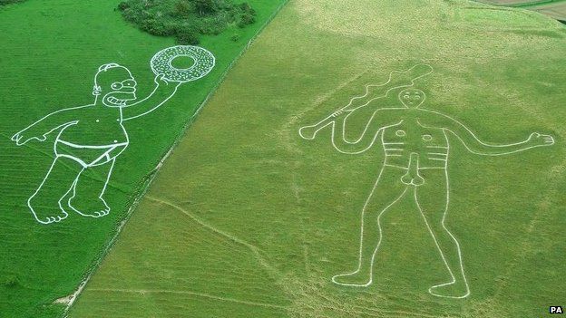 Cerne Abbas chalk hill giant censored for comic - BBC News