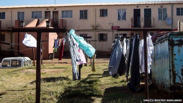 Inside South Africa's 'dangerous' men's hostels - BBC News