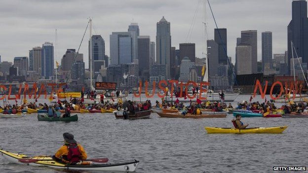 'Paddle in Seattle' Arctic oil drilling protest - BBC News