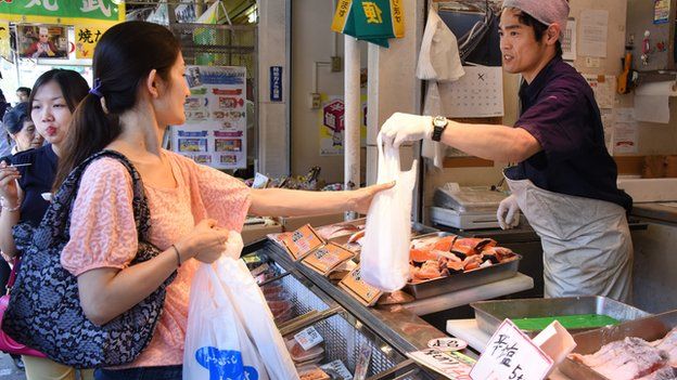 Japan's economy grows faster than expected - BBC News